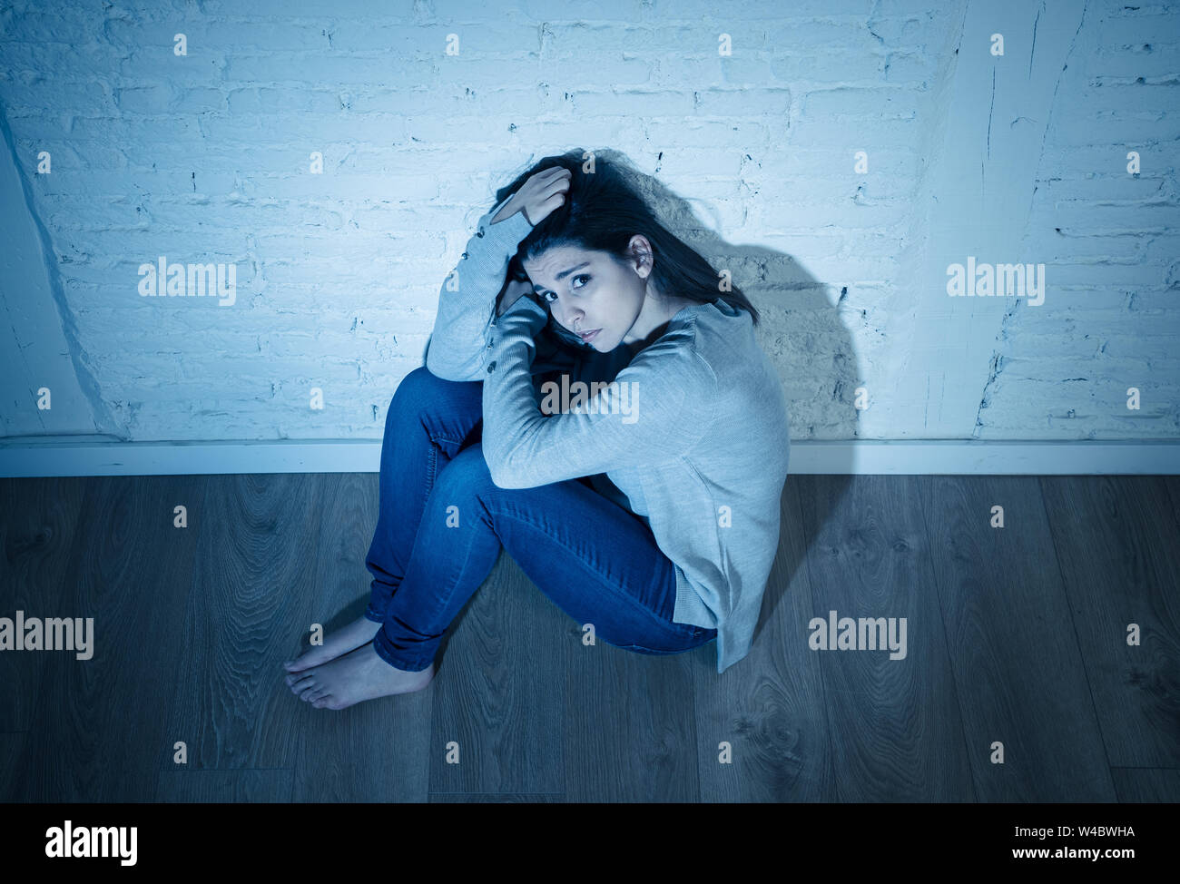 Portrait of young desperate latin woman feeling miserable, lonely ...