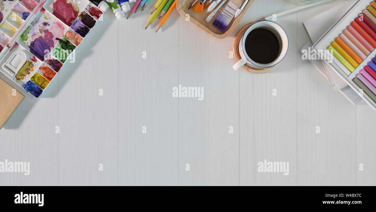 Artist workspace color on white wood table and copy space Stock Photo ...
