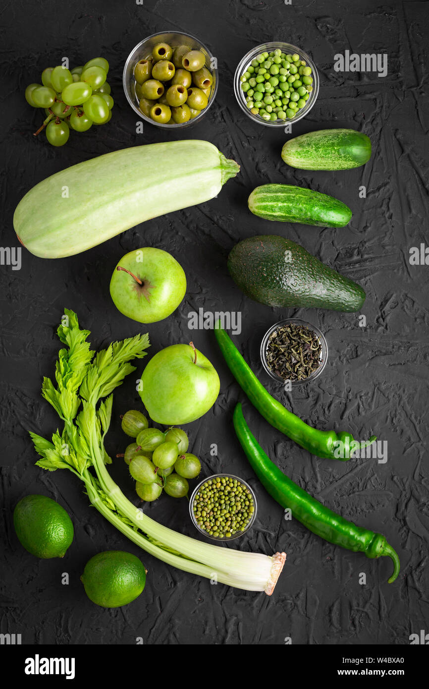 Flat lay of some seasonal green foods that are very healthy. A part of ...