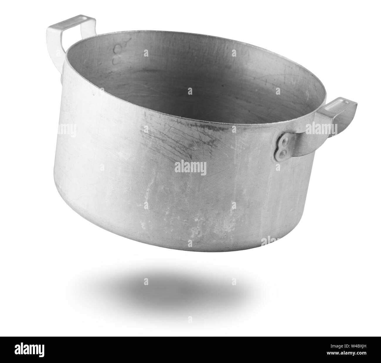Open stainless steel cooking pot over white background with clipping ...