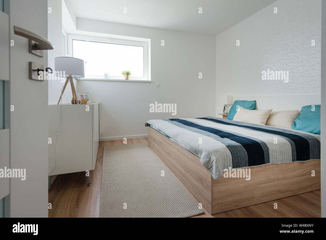 Contemporary bedroom interior of house Stock Photo - Alamy