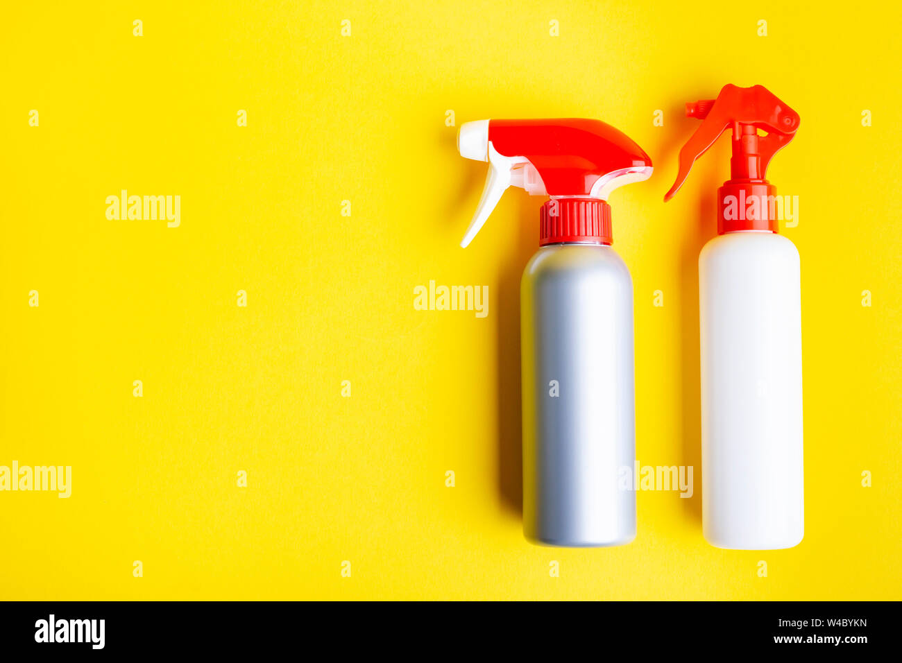 Sprays for cleaning on a bright yellow background. space for text Stock ...