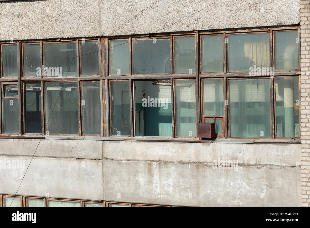 Big windows in the workshop hall abandoned building factory Stock Photo ...