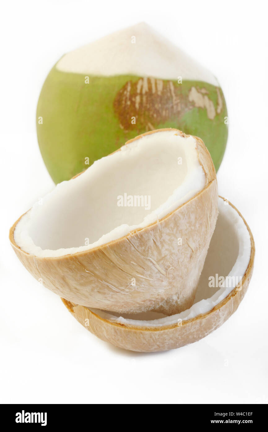 peeled young coconut on white background Stock Photo - Alamy