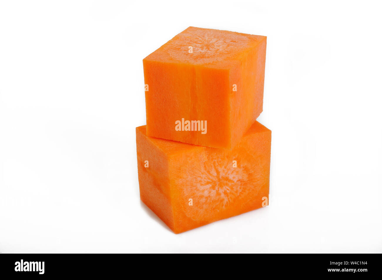 carrot cube isolated on white background Stock Photo - Alamy