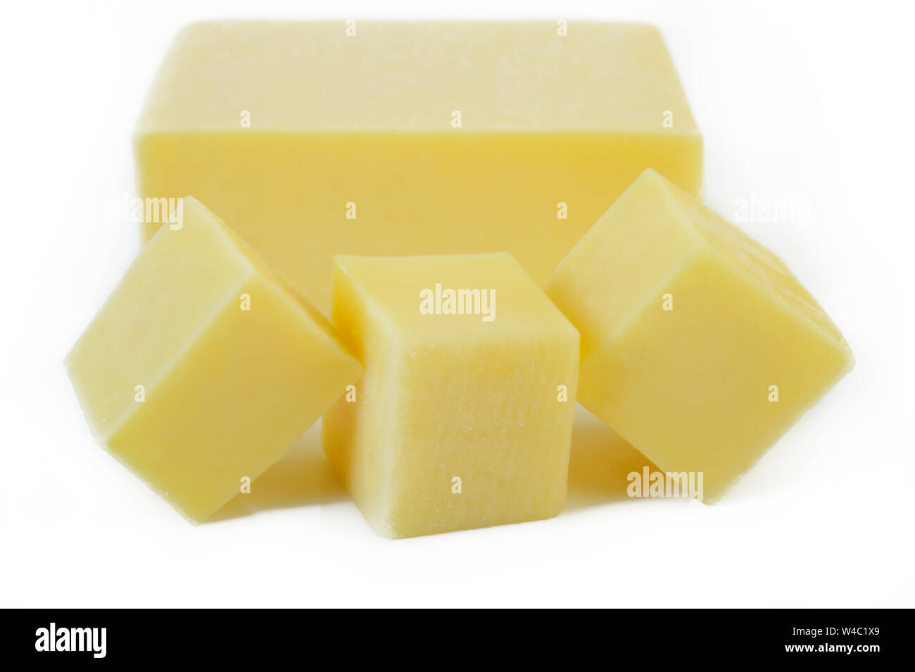 cheese cubes isolated on white background Stock Photo - Alamy