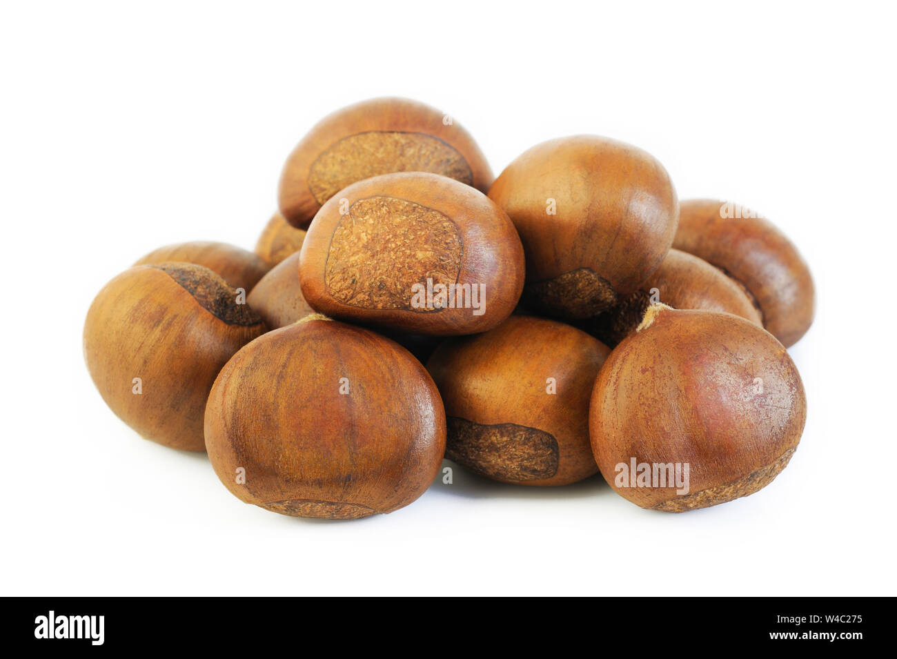 Roasted chestnuts on white background Stock Photo - Alamy