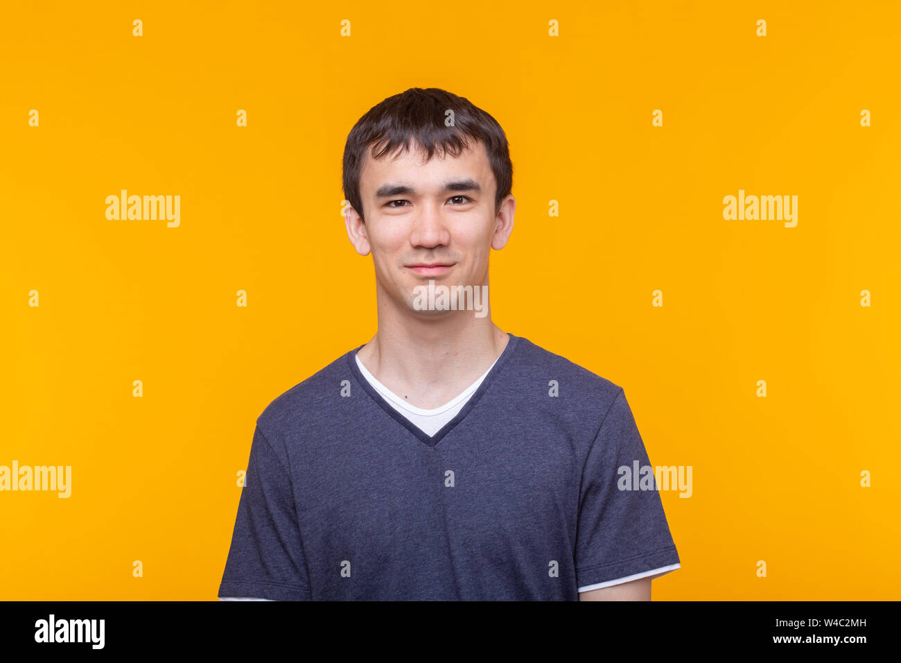 Handsome indian man yellow head hi-res stock photography and images - Alamy