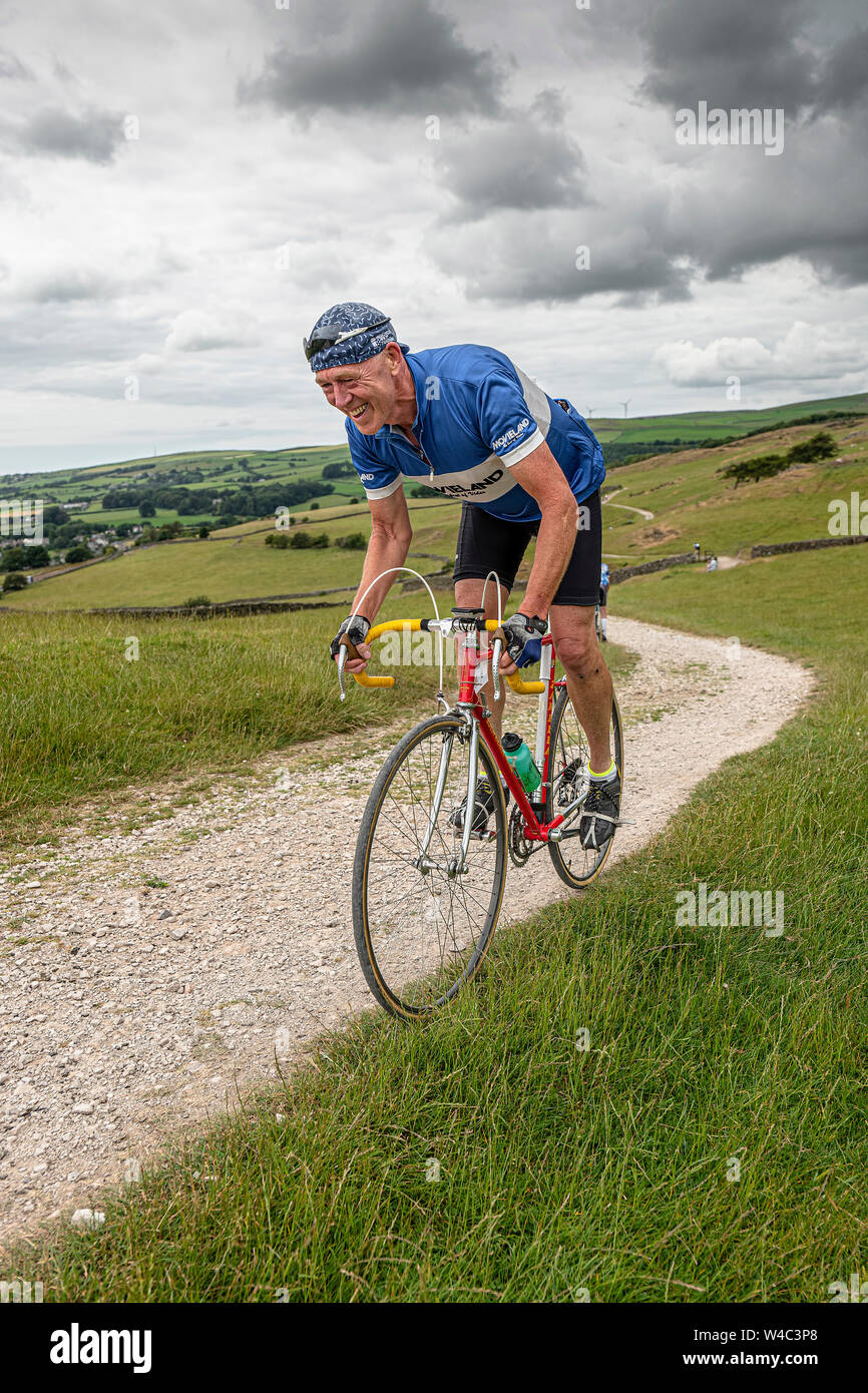 Vintage man cycling hi-res stock photography and images - Alamy