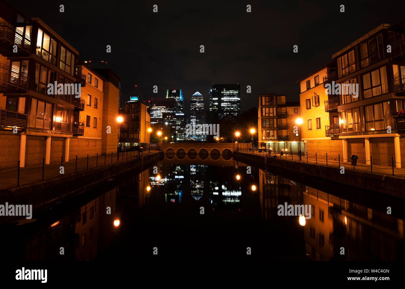 Canary Wharf at night, captured from the Blackwall Basin in London ...