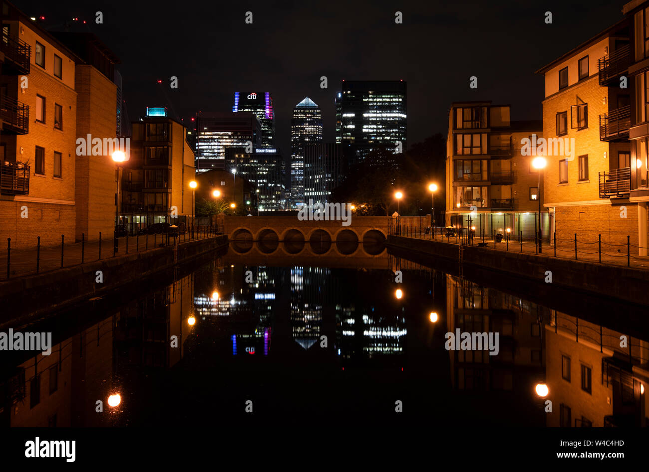 Canary Wharf at night, captured from the Blackwall Basin in London ...