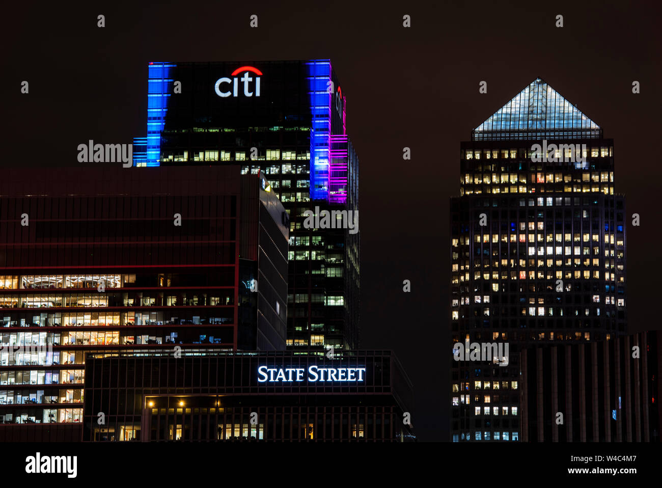 Canary Wharf at night, captured from the Blackwall Basin in London ...