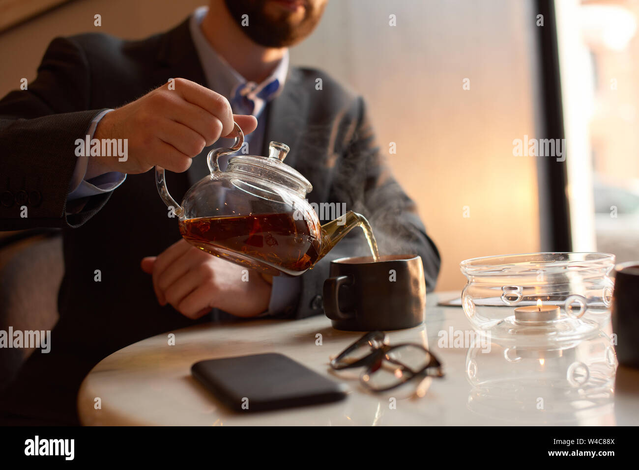 Man tea suit hi-res stock photography and images - Alamy