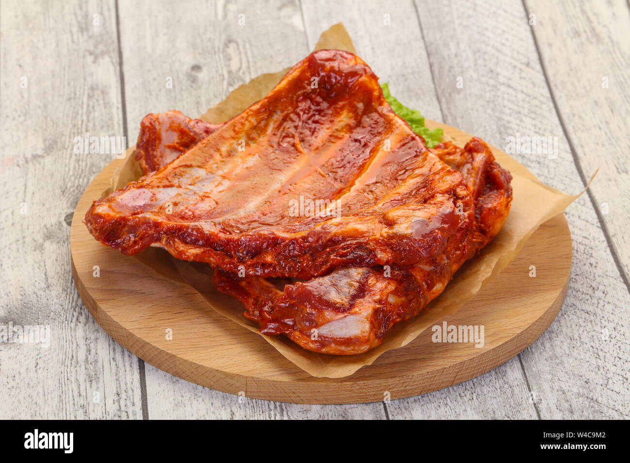 Raw marinated pork ribs ready for cooking Stock Photo - Alamy