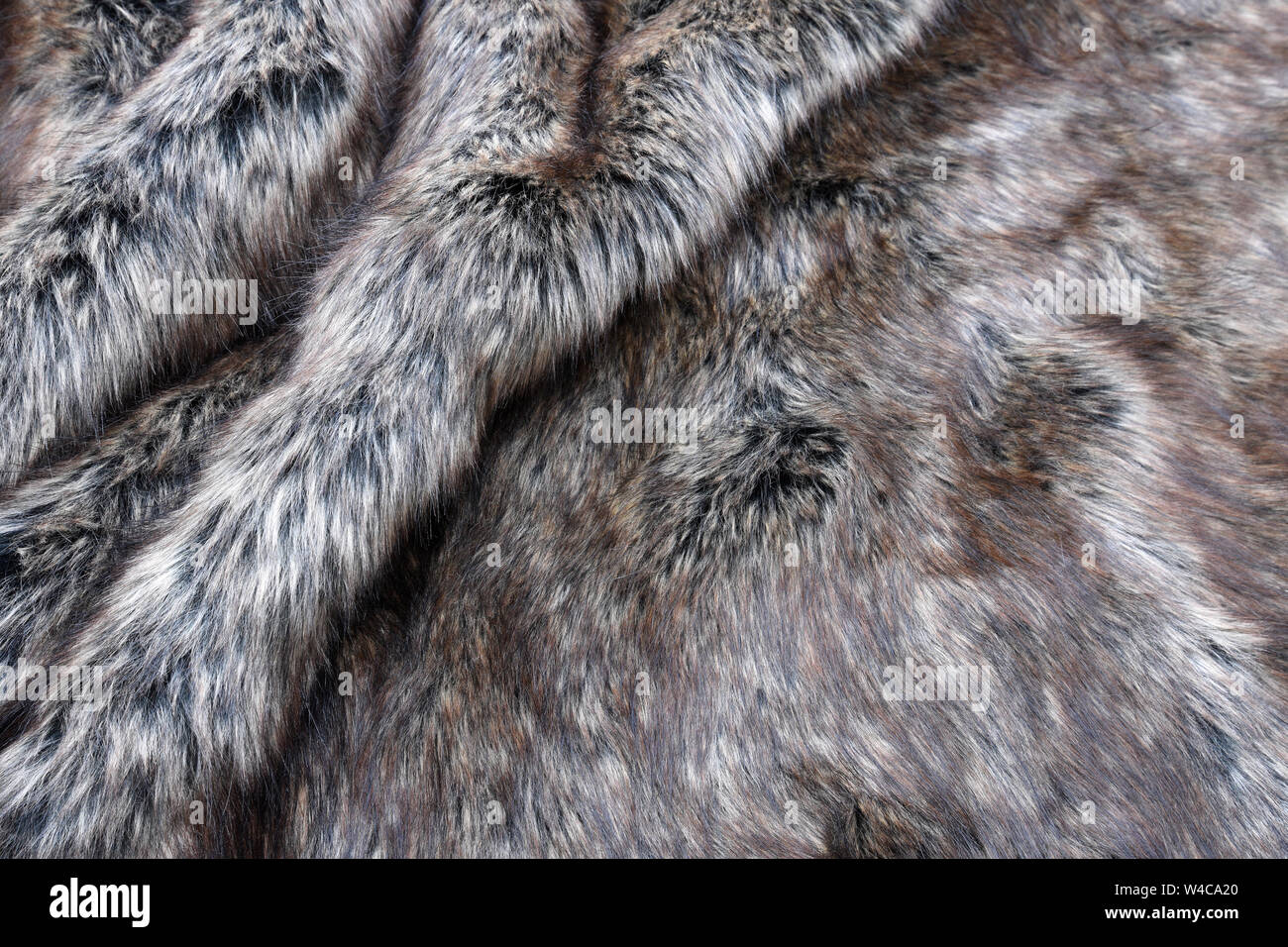 Wolf fake fur texture background Stock Photo - Alamy