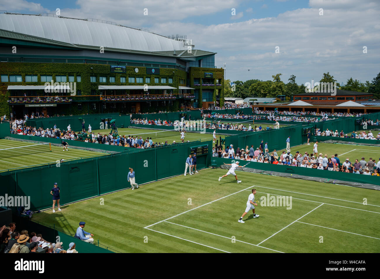 General View of action on Court 8 with Centre Court behind. The ...