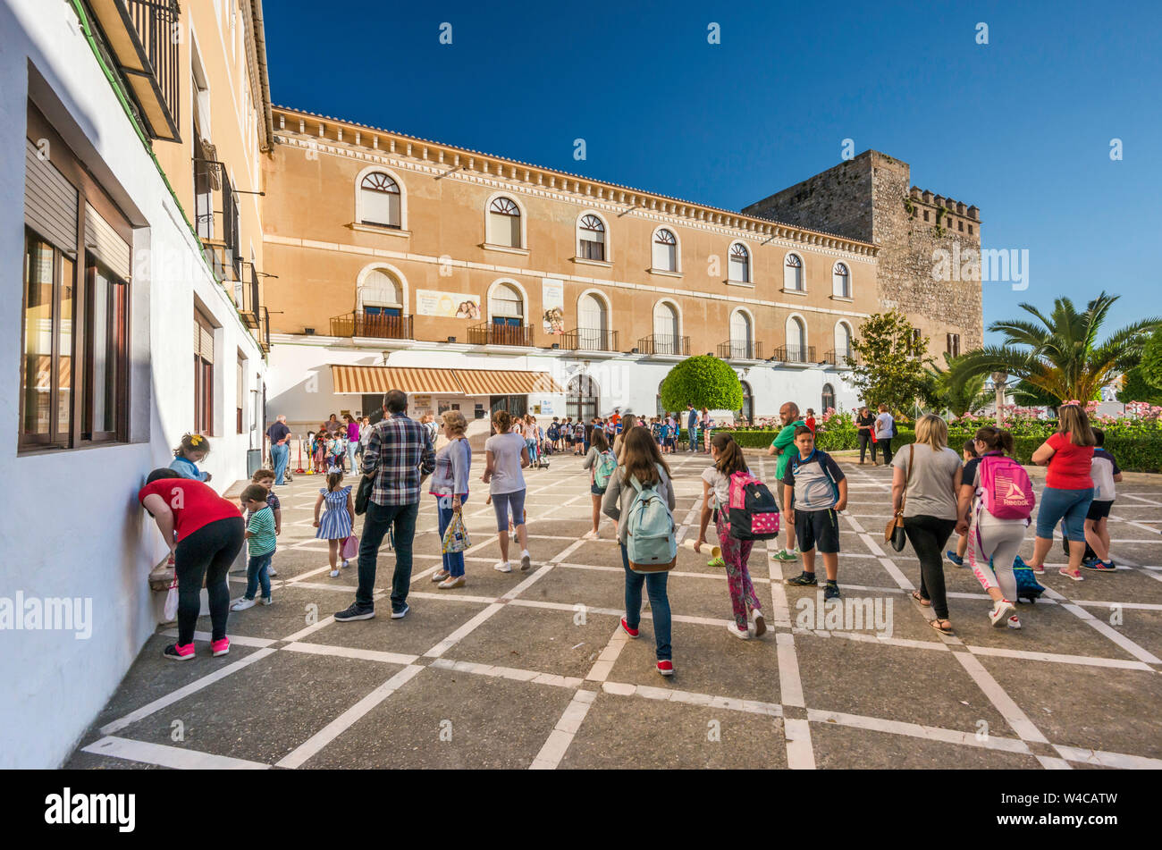 Children gathering at courtyard, Castillo Condes de Cabra, in Cabra ...
