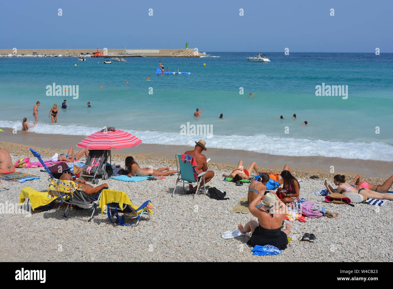 Woman sunbathing beach spain hi-res stock photography and images - Alamy