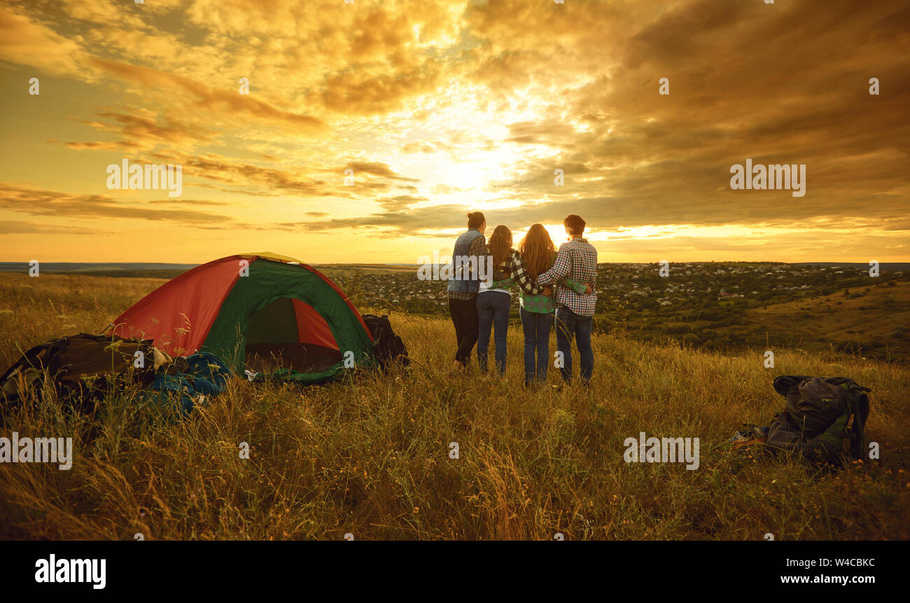 Camping tent camp people tourists sitting the sunset in nature Stock ...