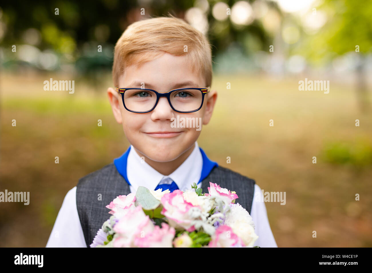 Educational theme: portrait of a schoolboy with big black glasses and ...