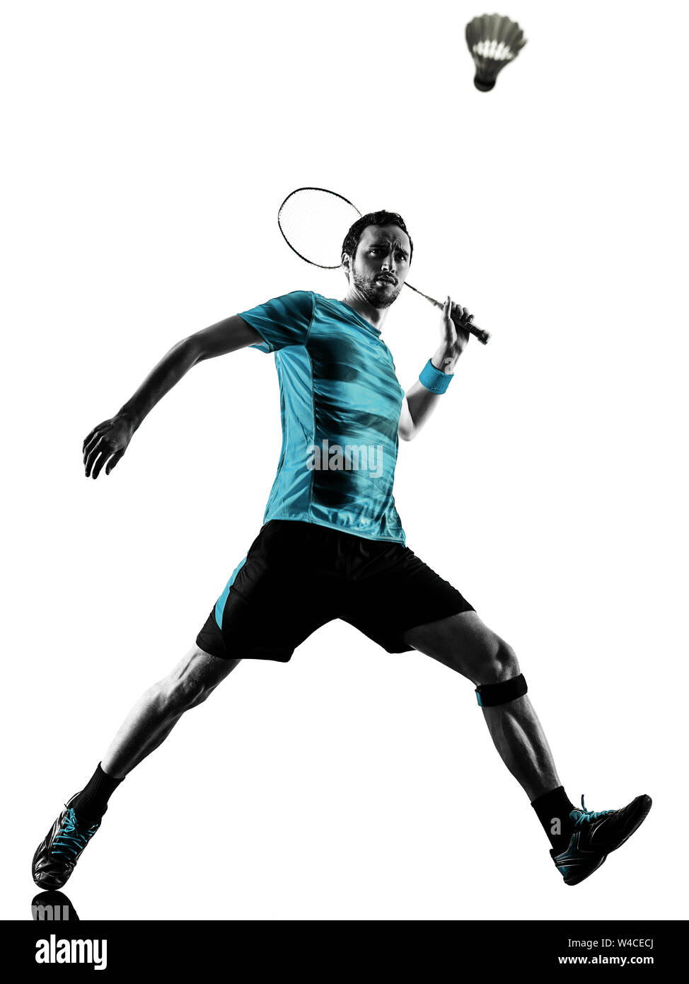 one caucasian Badminton player man in studio shadow silhouette isolated ...