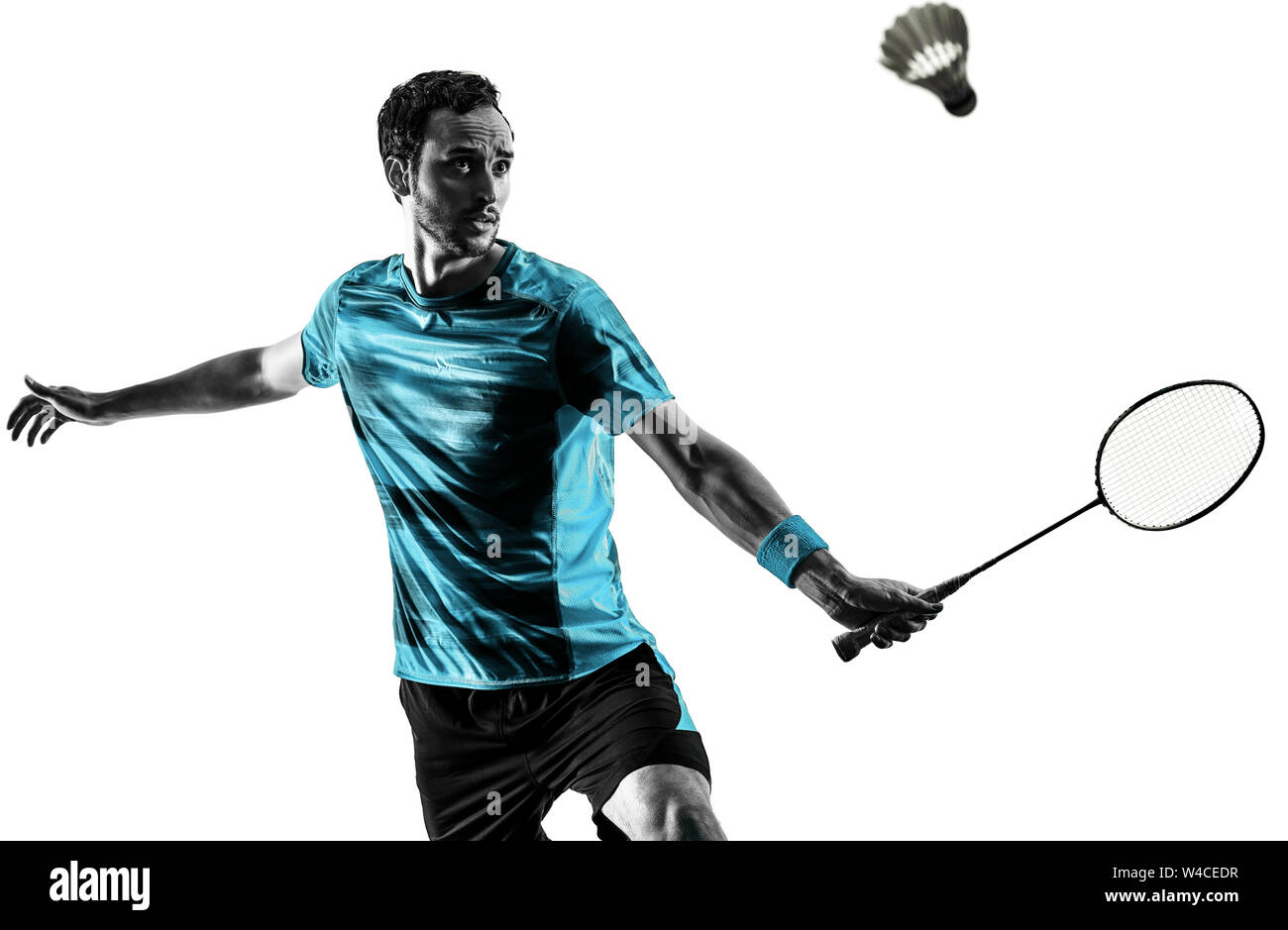 one caucasian Badminton player man in studio shadow silhouette isolated ...