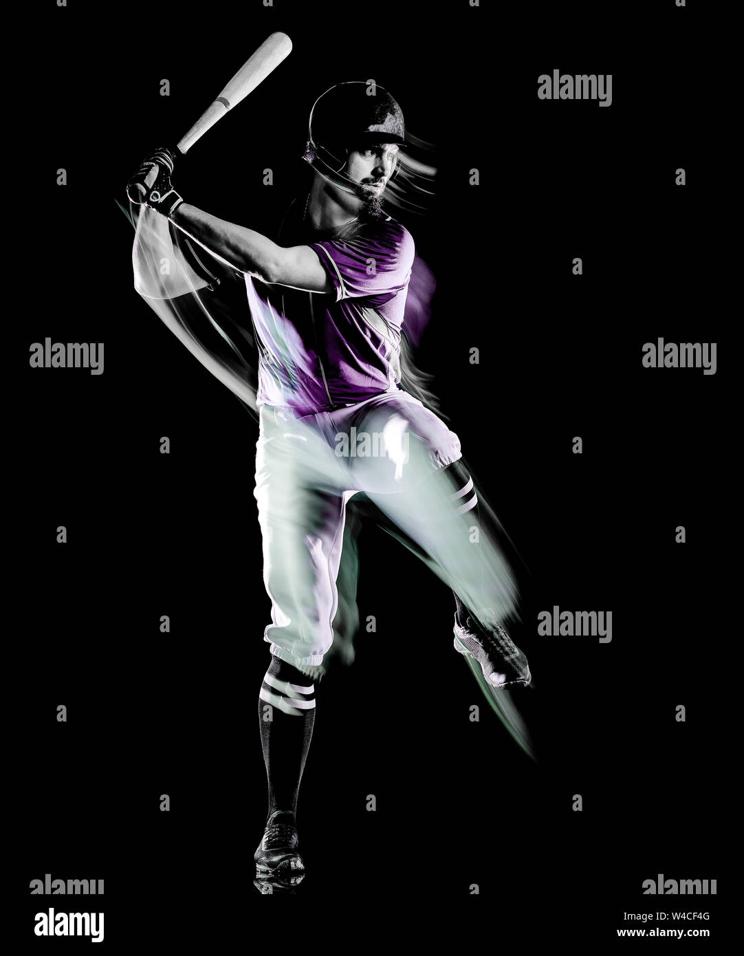 one caucasian baseball player man studio shot isolated on black ...