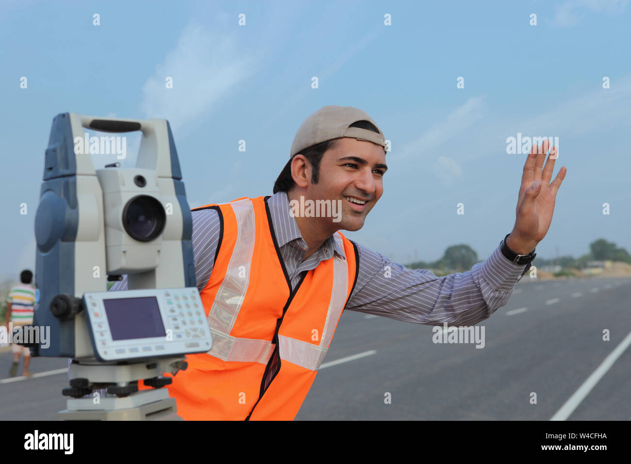 Surveyor using theodolite on tripod Stock Photo - Alamy Surveyor using theodolite on tripod Stock Photo - Alamy