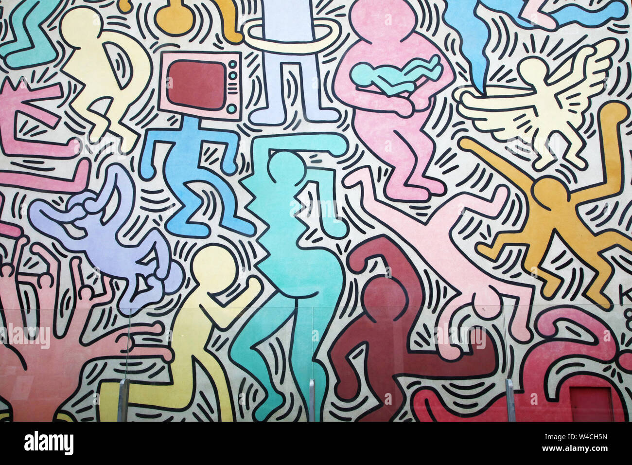 Many figures painted by Keith Haring, horizontal. Details from a huge ...