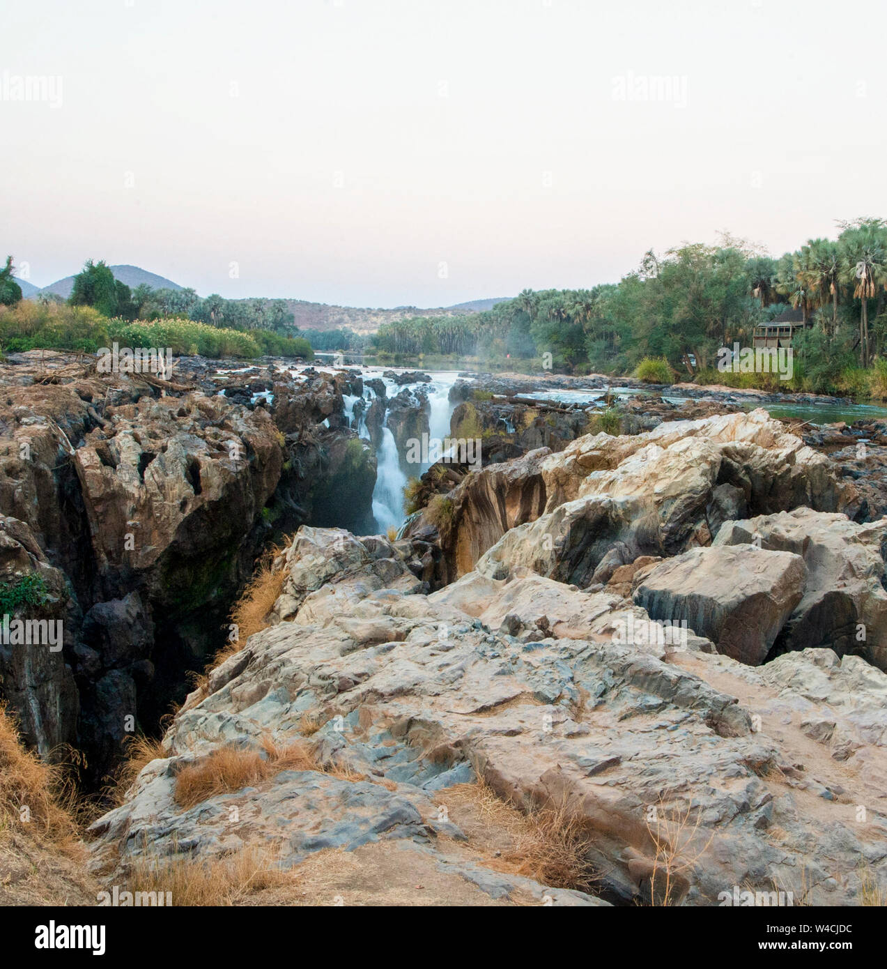 River rushing over jagged cliffs, Epupa falls Cunene River in Namibia ...