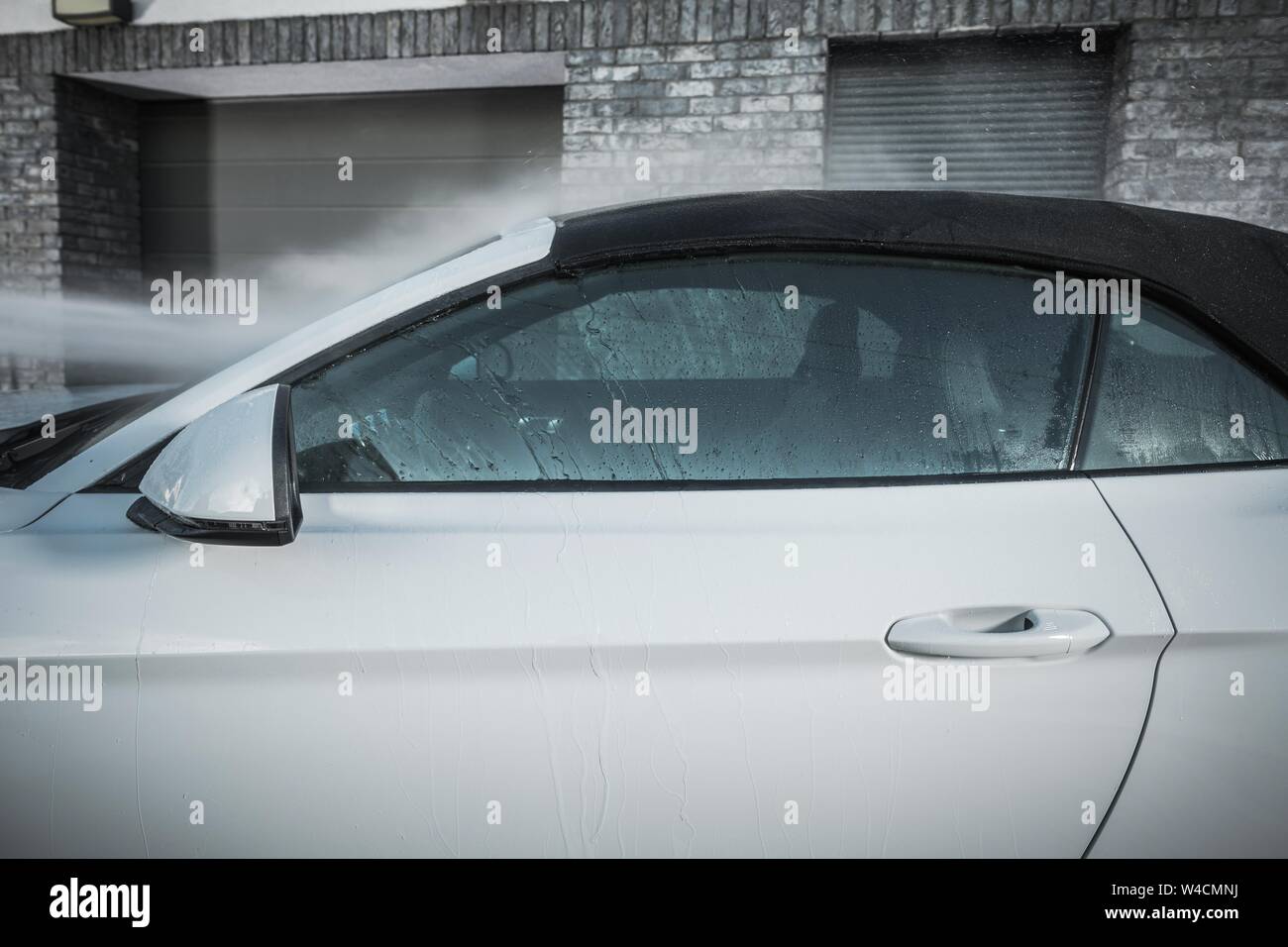 Gentle Washing Convertible Car Soft Roof Using Pressure Washer ...