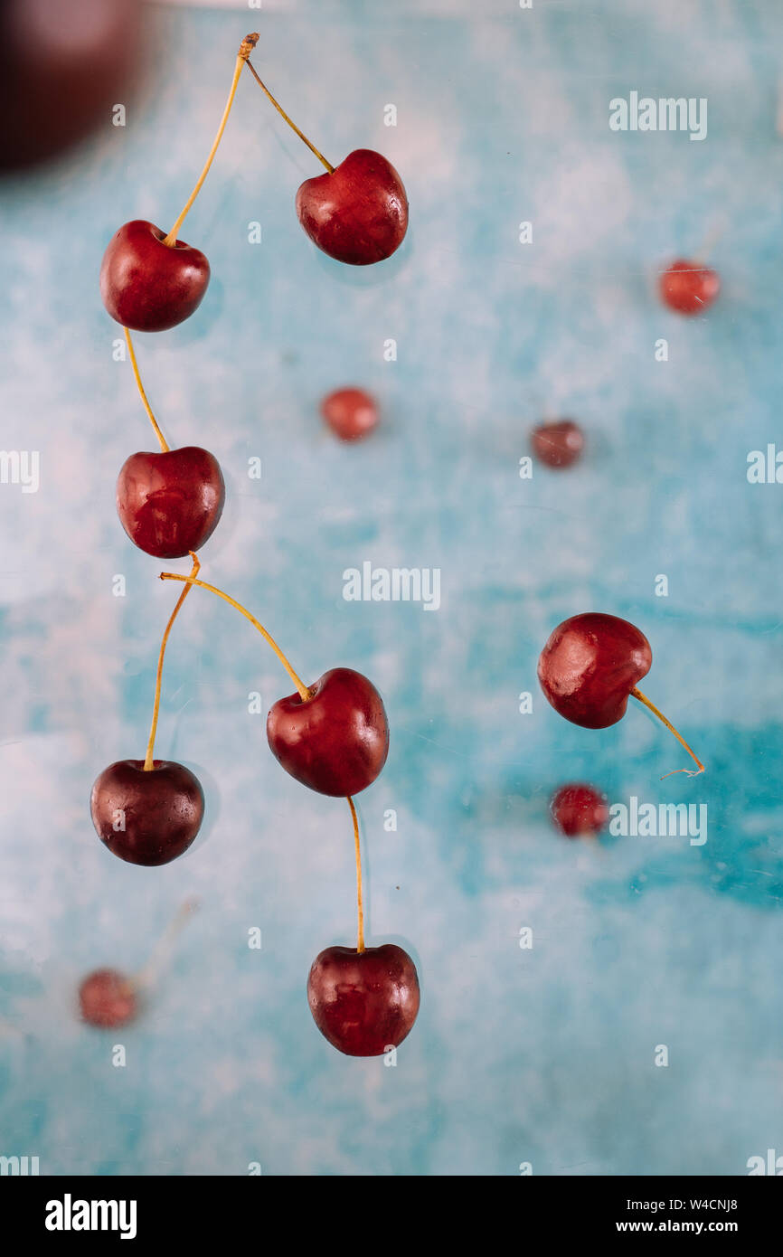 Falling cherry. Composition with flying sweet red berries. Cherry ...