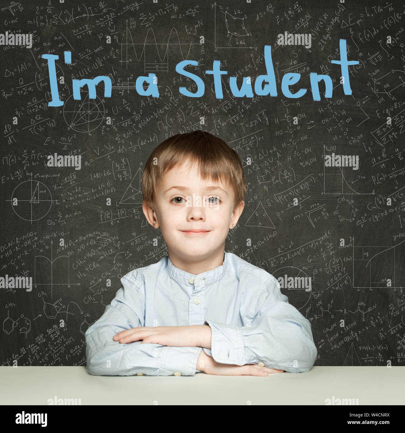Clever child pupil on blackboard background portrait. Back to school ...