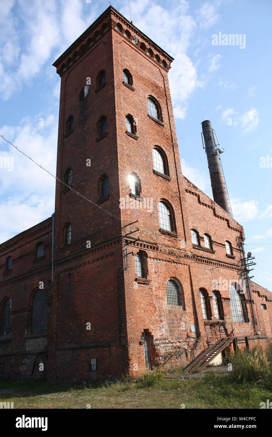 Old closed distillery in Poland. Building made of brick Stock Photo - Alamy