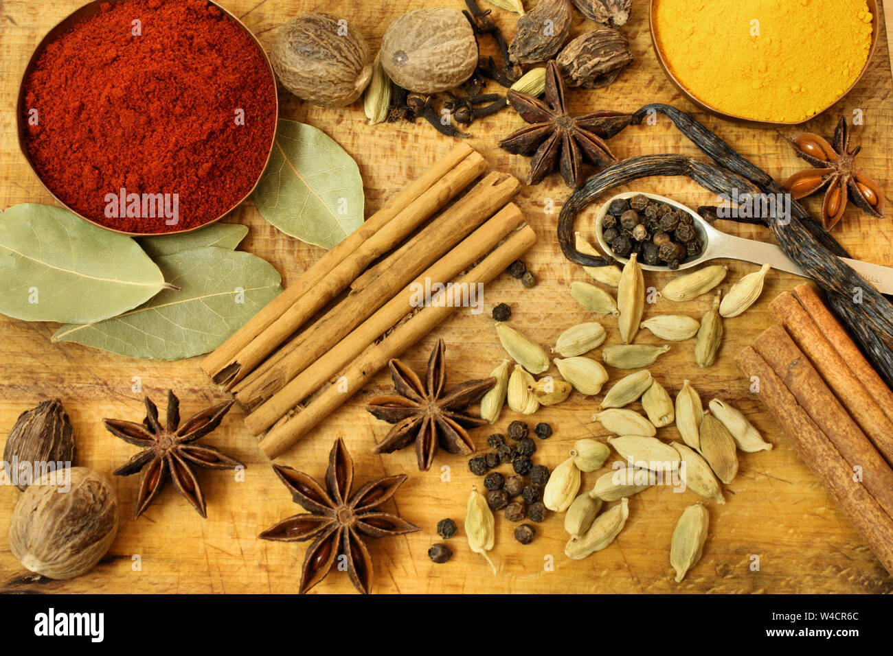 Turmeric and spices on rustic wood background hi-res stock photography ...