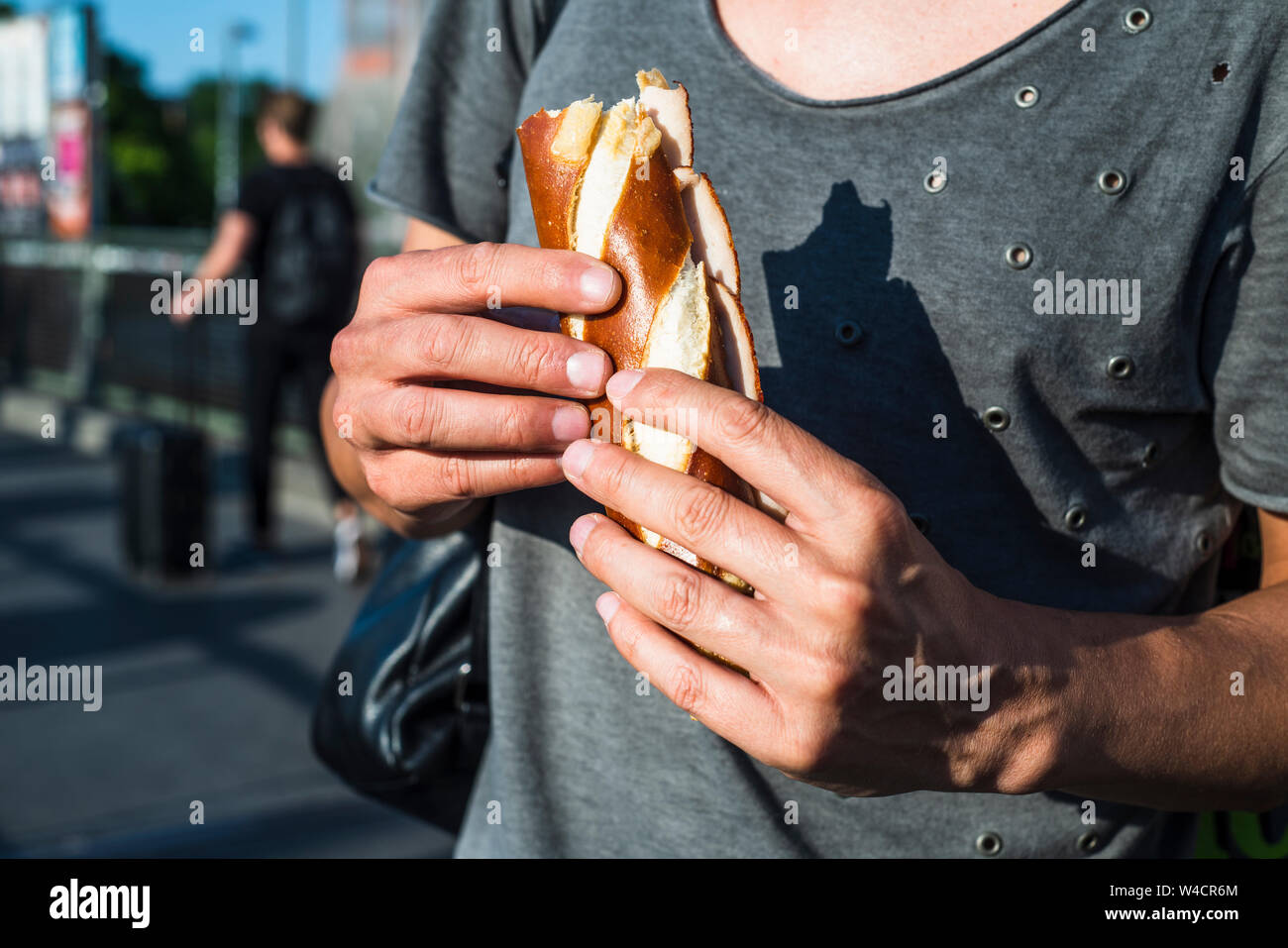 Man eating sandwich on outdoors hi-res stock photography and images - Alamy