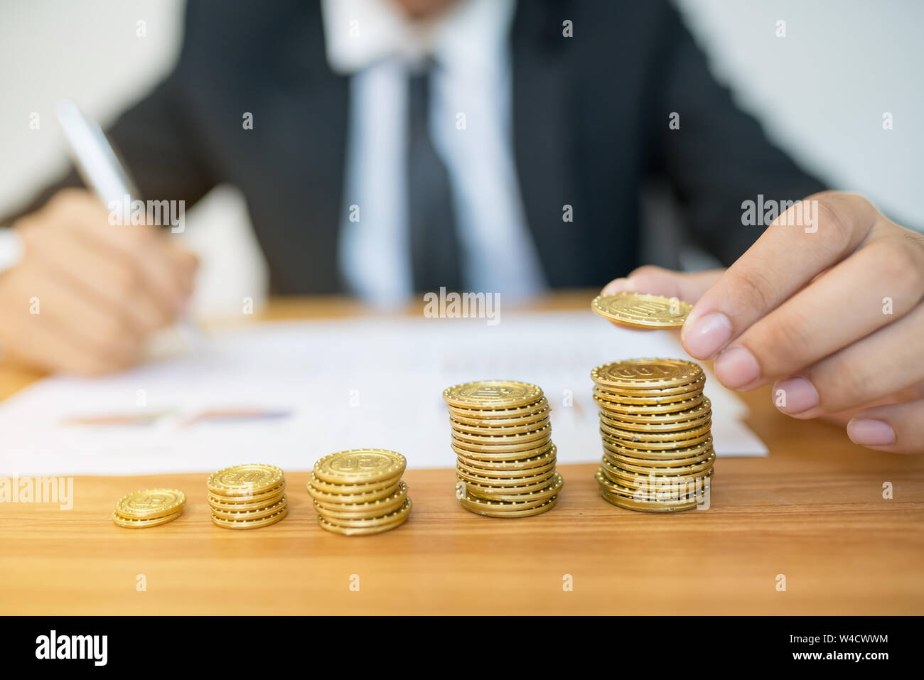 Coins on stairs hi-res stock photography and images - Alamy