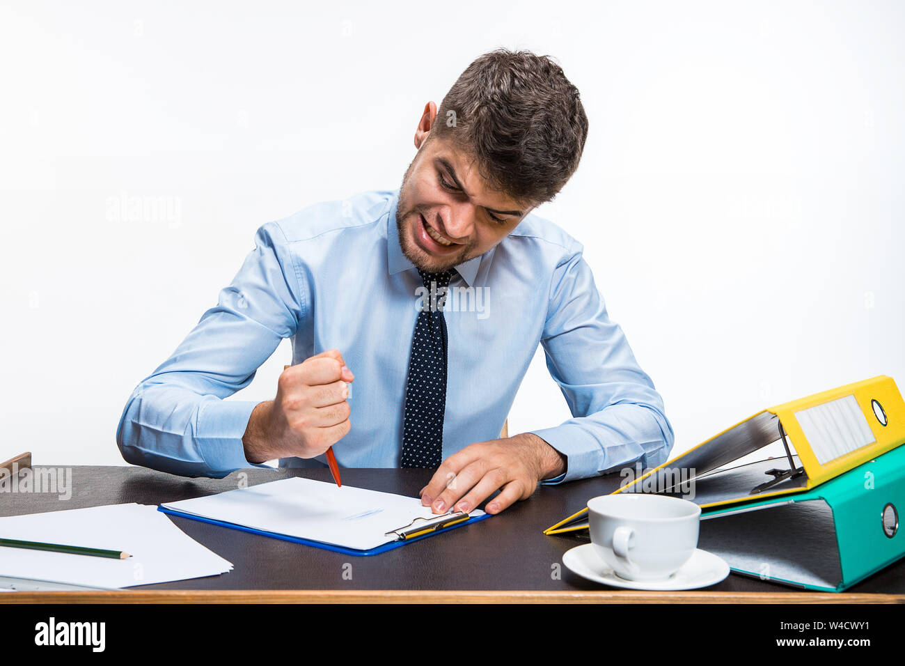 The ink in the pen ended abruptly and the man is forced to write in ...