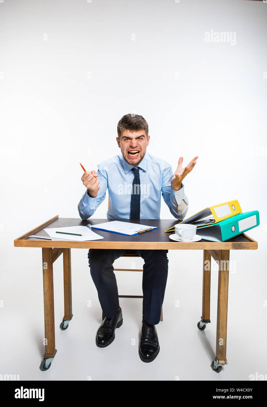 The ink in the pen ended abruptly and the man is forced to write in ...