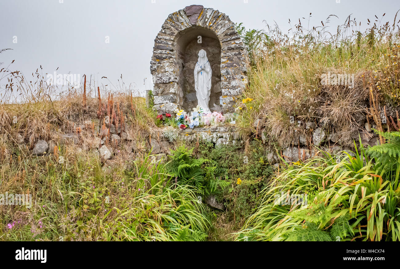 Statue of St Non at St Non’s Chapel, St Non’s Bay on the Welsh coastal ...