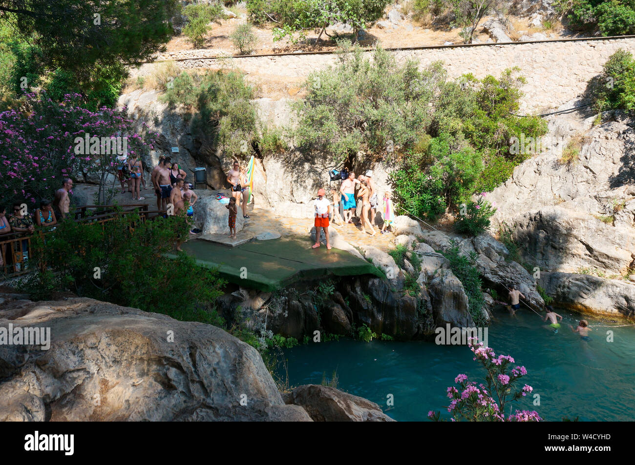 Benidorms, Alicante, Spain - July 2019: People jumping in Algar ...