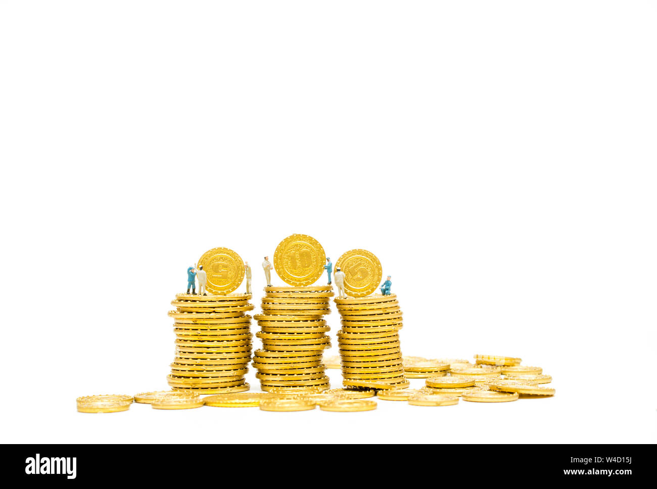 miniature people with gold coin on white background Stock Photo - Alamy