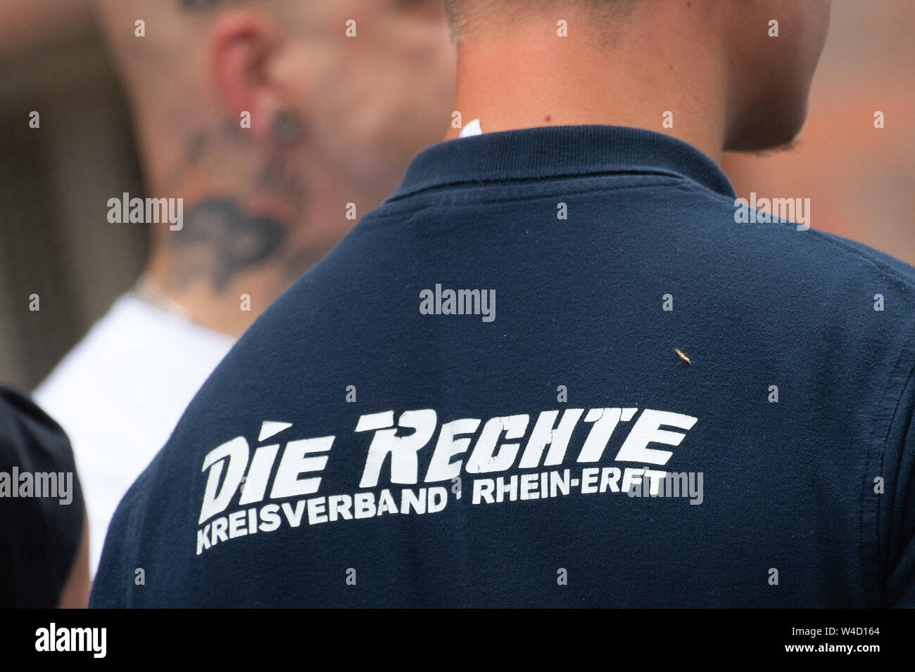 Kassel, Germany. 20th July, 2019. A participant with an imprint on the ...