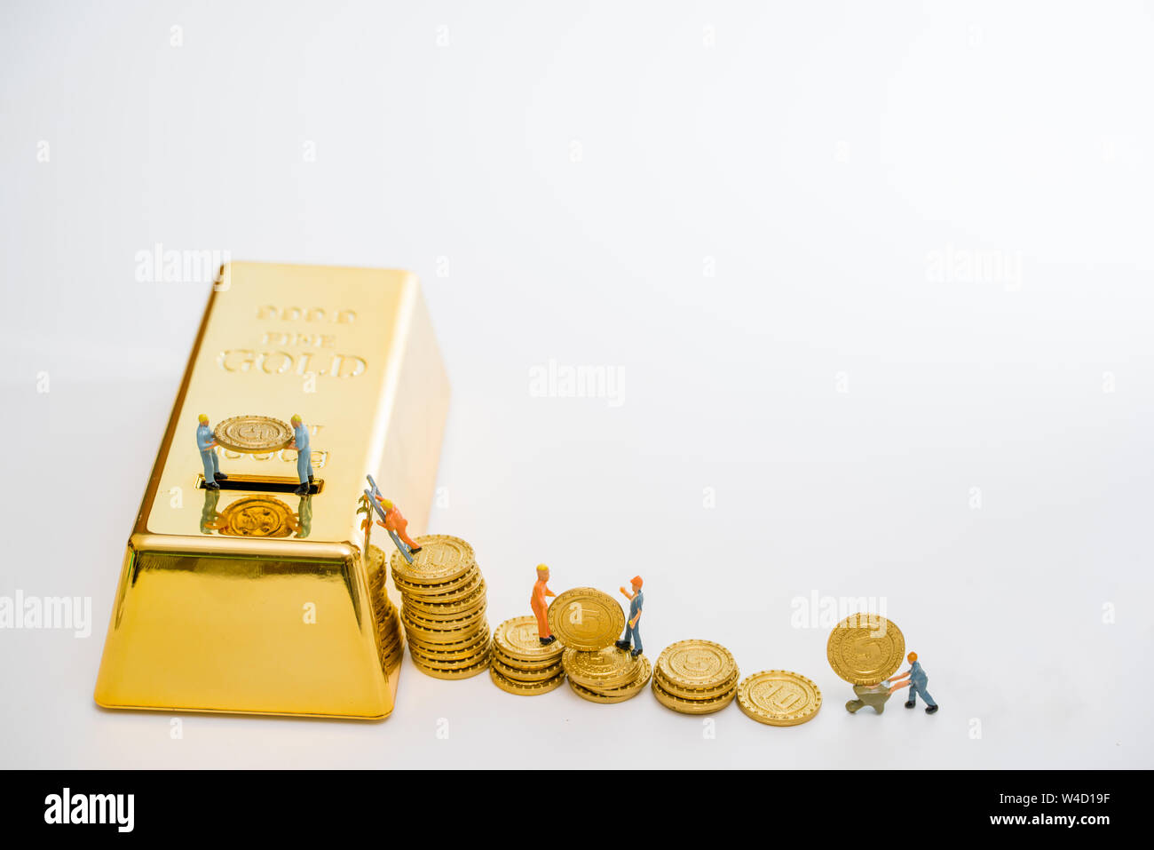 miniature people with cold coin on white background,financial concept ...