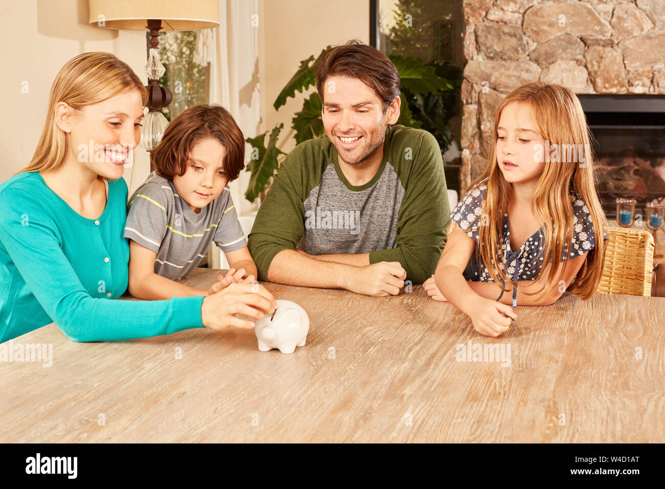 Family kids money hi-res stock photography and images - Alamy