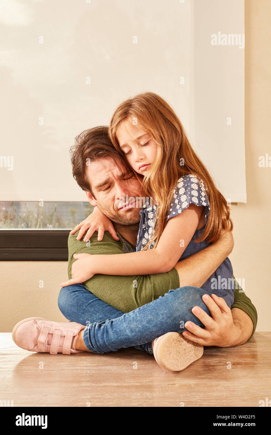 Sad father comfort sad daughter hi-res stock photography and images - Alamy