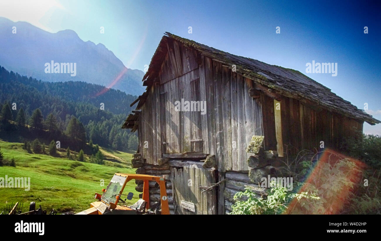 barn and meadow in Alta Badia, Alps Italy Stock Photo - Alamy