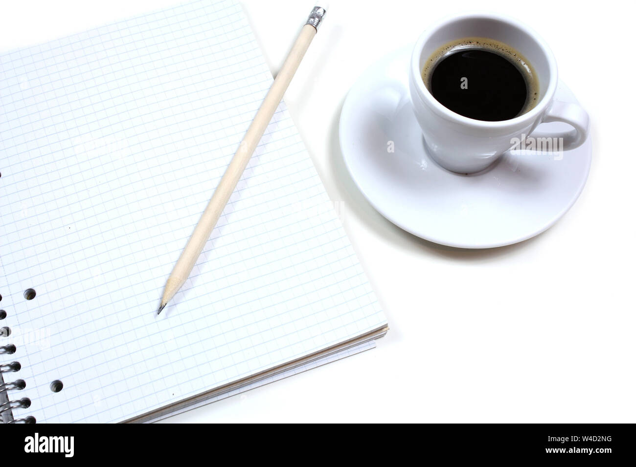 Coffee and notebook isolated over white Stock Photo - Alamy