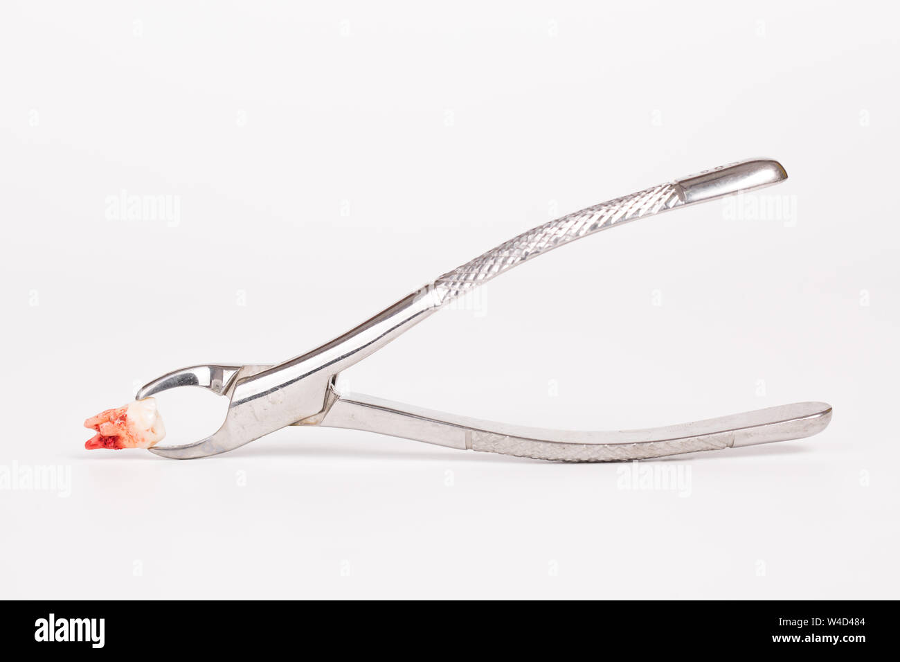 Dental tools and remove tooth at clinic isolated on white Stock Photo ...