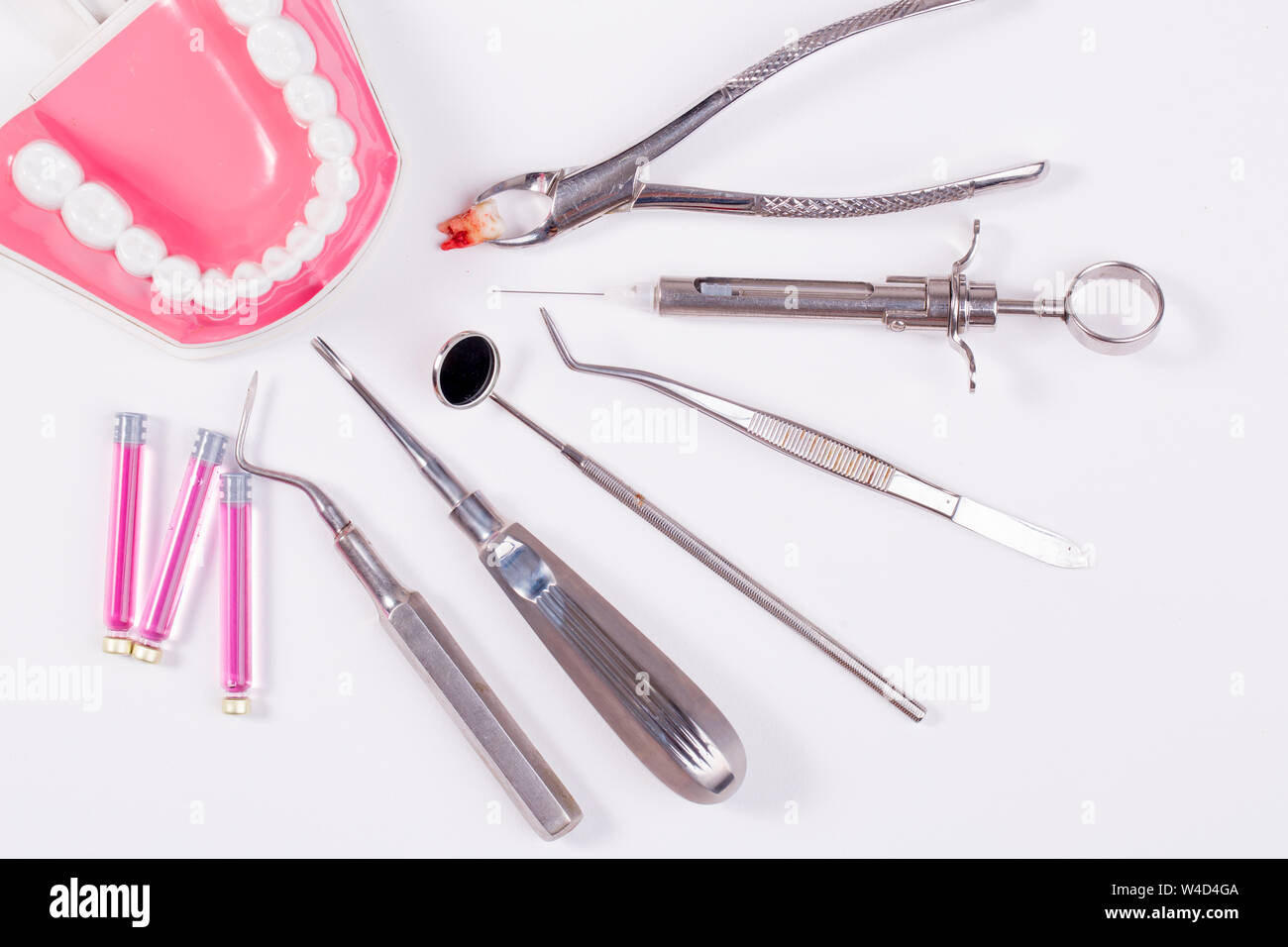 Various dental equipment isolated on white background Stock Photo - Alamy